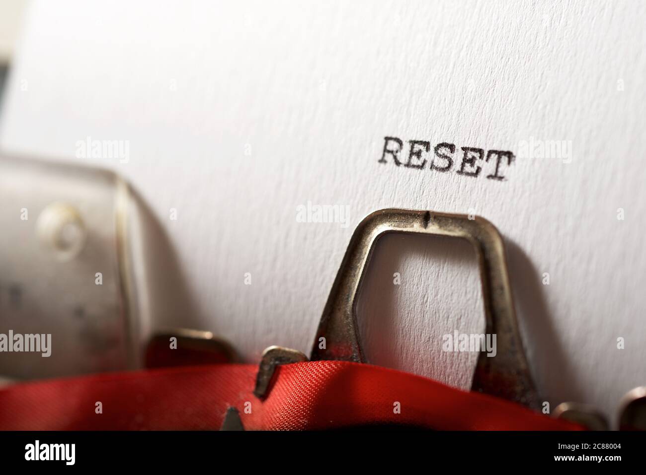 Reset word written with a typewriter Stock Photo - Alamy