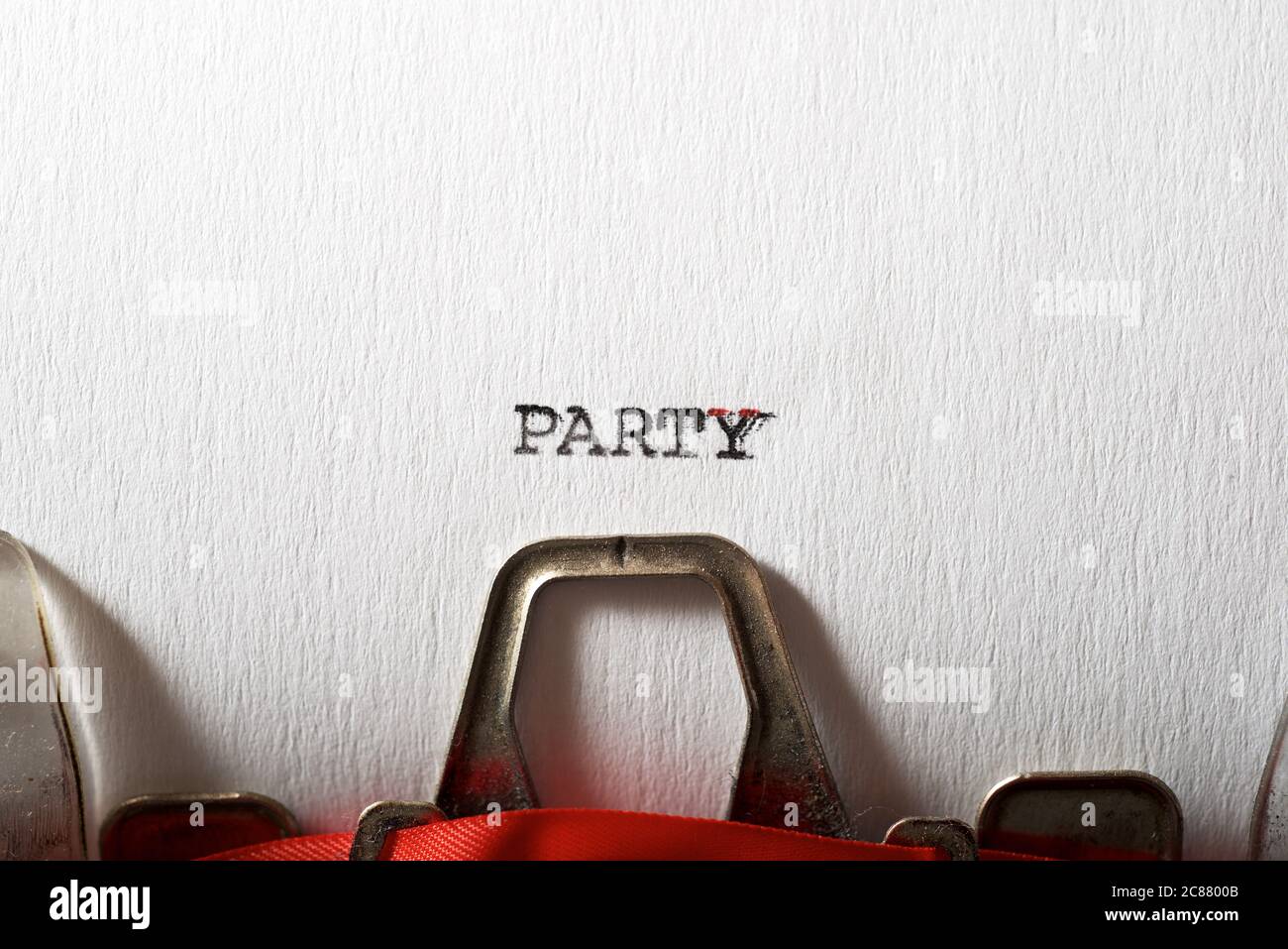 Party word written with a typewriter Stock Photo - Alamy