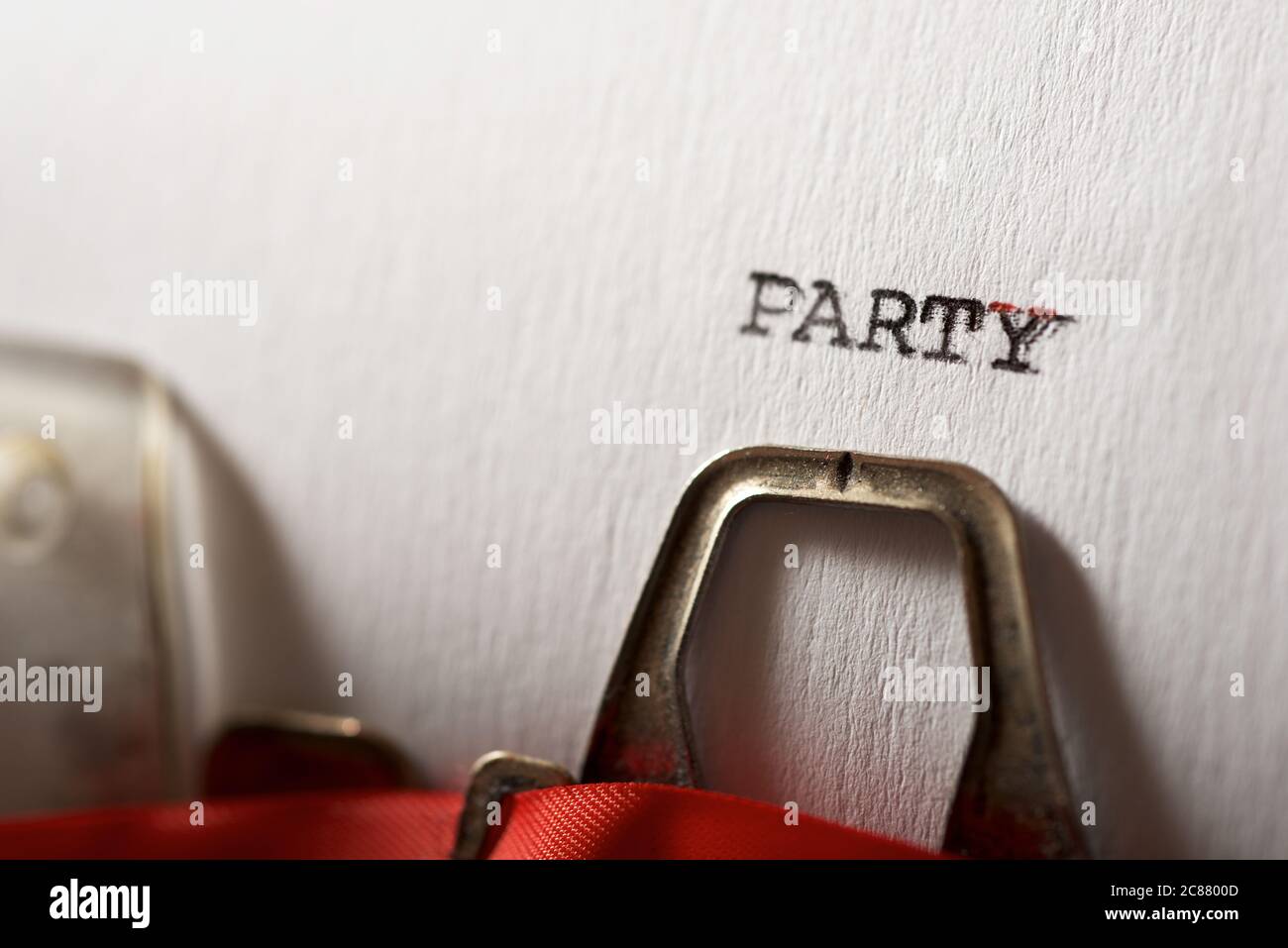 Party word written with a typewriter Stock Photo - Alamy