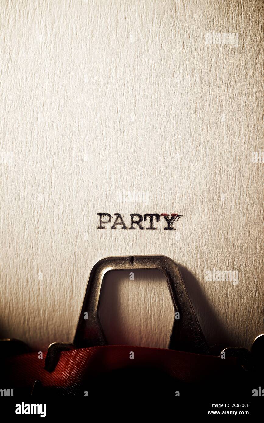 Party word written with a typewriter Stock Photo - Alamy