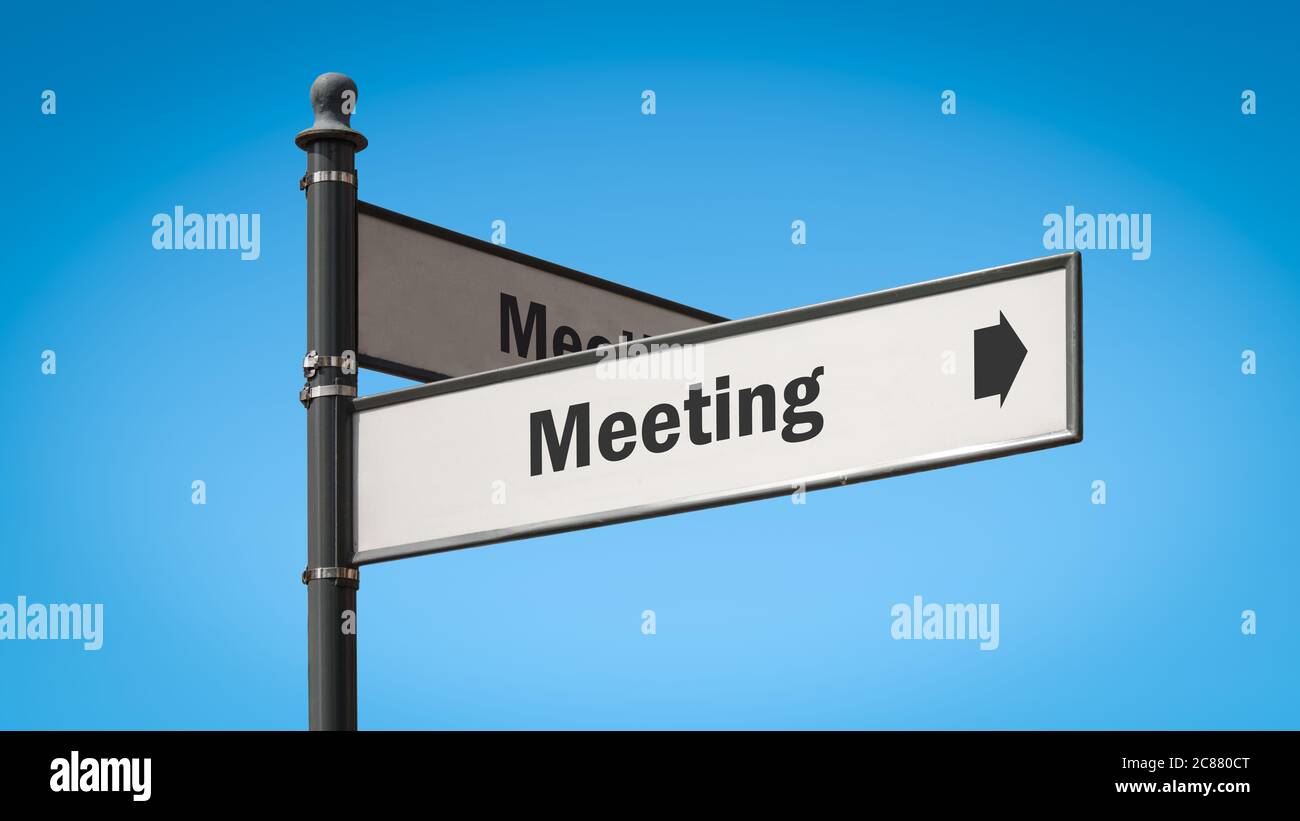 Street Sign the Direction Way to Meeting Stock Photo - Alamy
