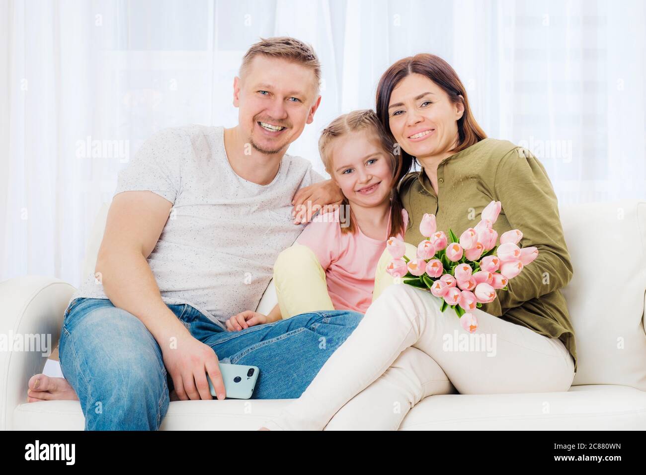 Lovely happy big family enjoying weekend holidays together indoors ...