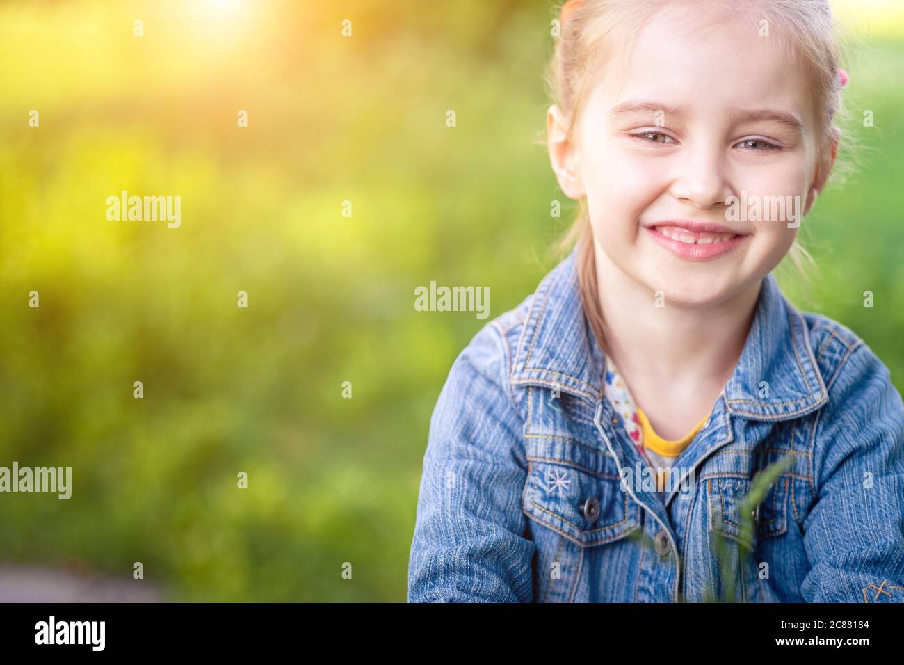 Portrait Smiling attractive girl outdoors Stock Photo - Alamy Portrait Smiling attractive girl outdoors Stock Photo - Alamy