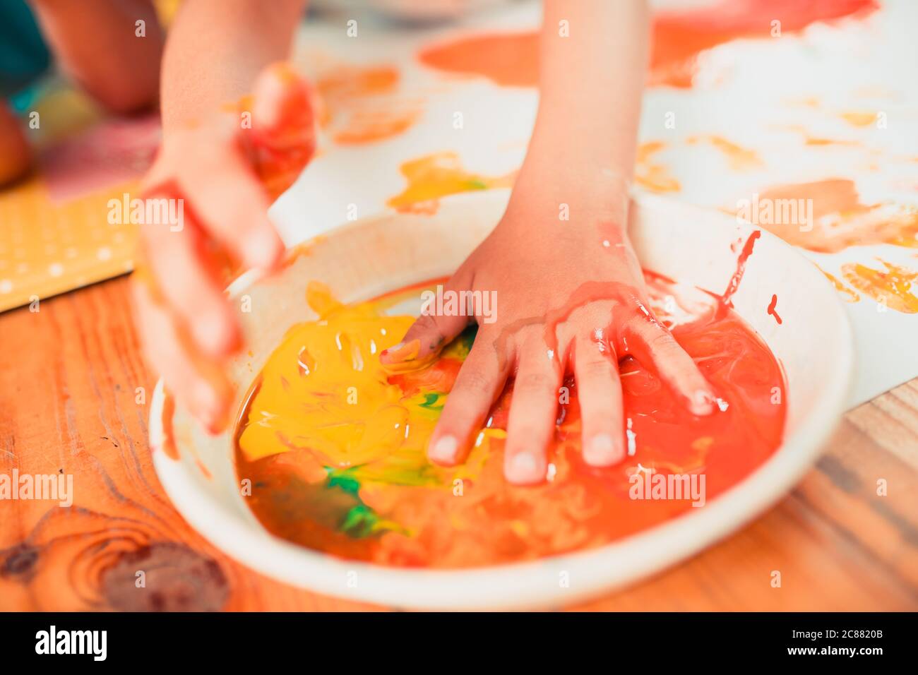 Kids put hands up classroom hi-res stock photography and images - Alamy