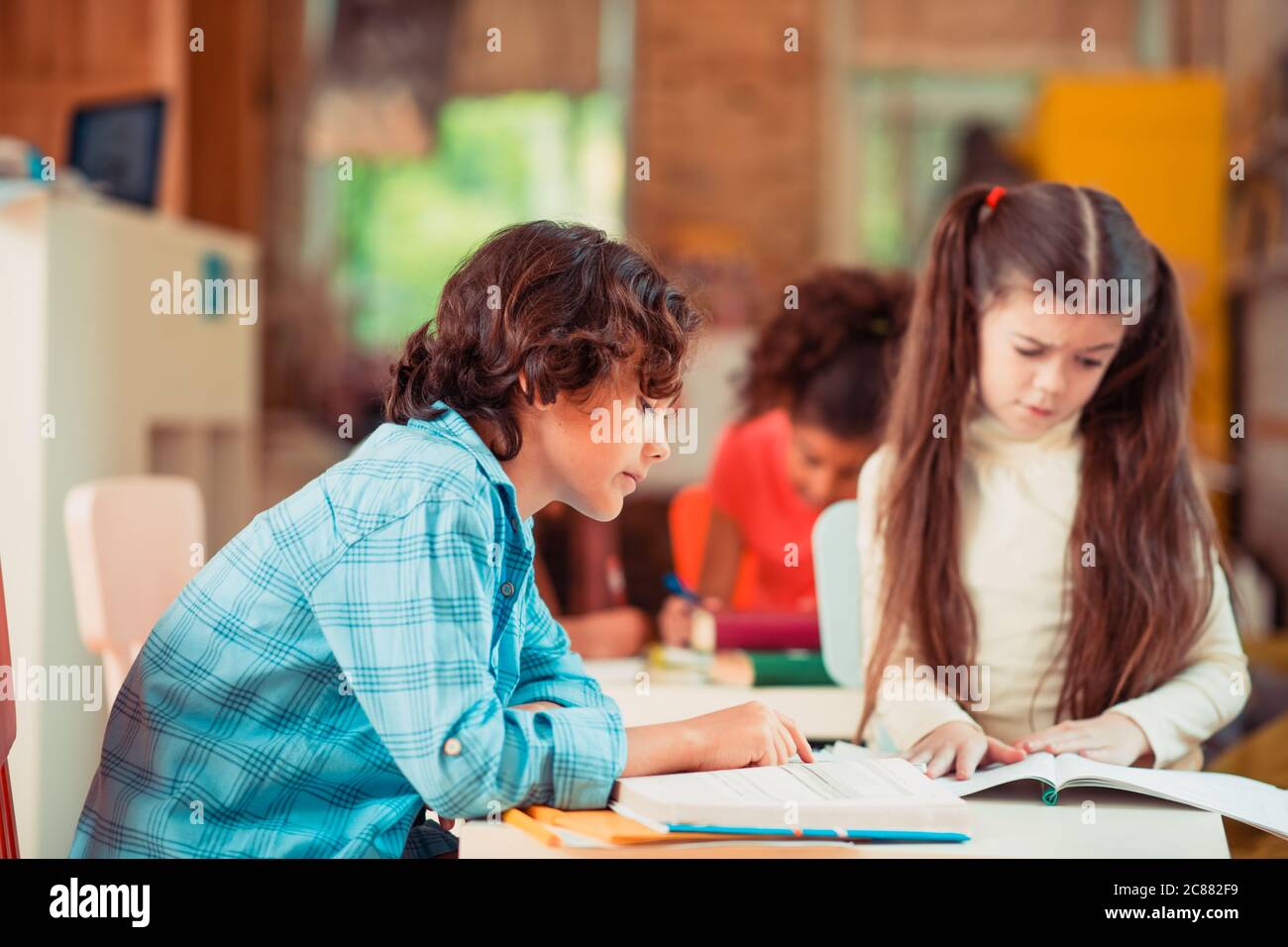 Reading assignment class hi-res stock photography and images - Alamy