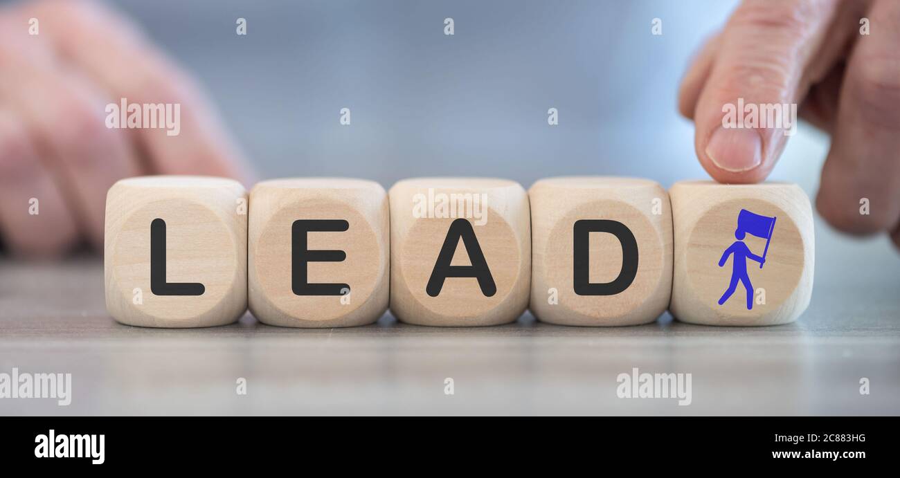 Concept of leadership on wooden cubes Stock Photo - Alamy