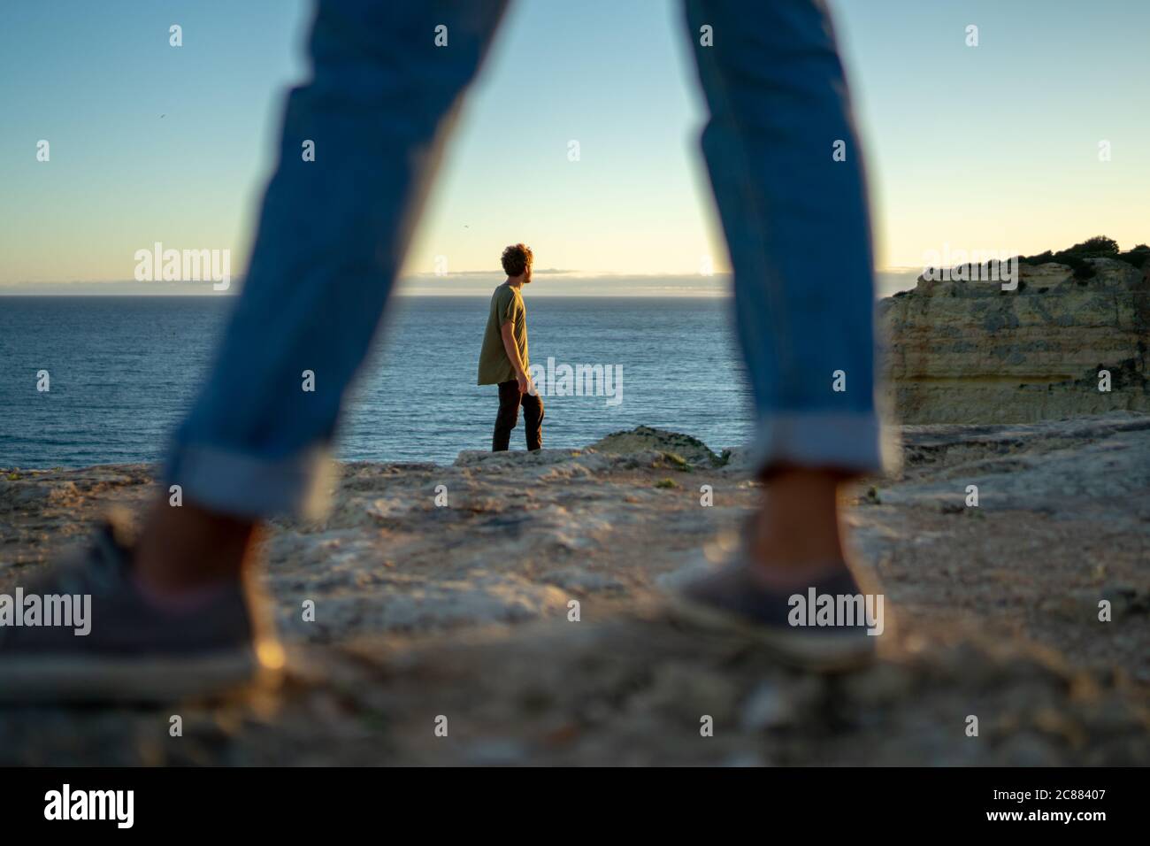 Woman looking through legs hi-res stock photography and images - Alamy