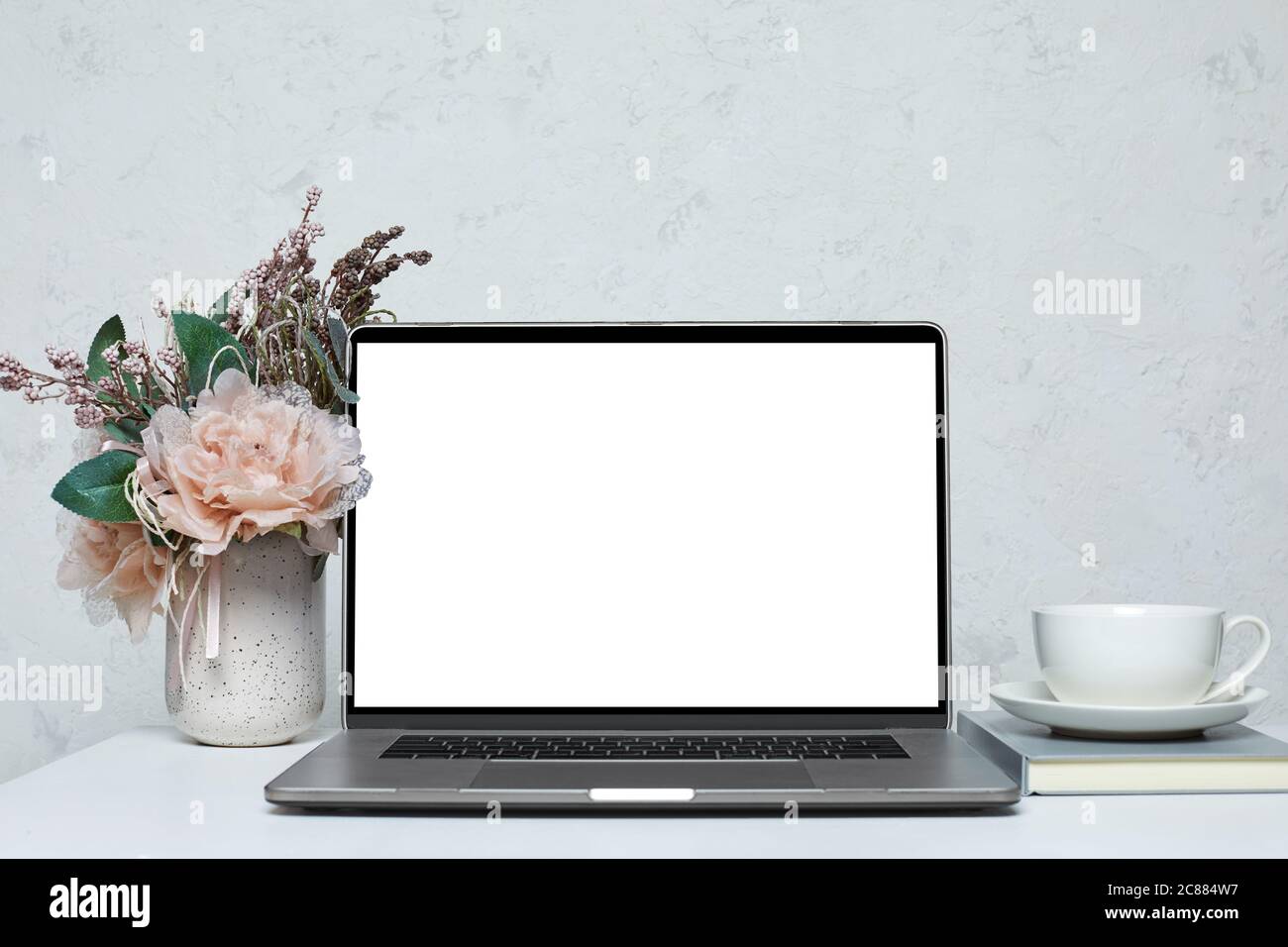 Laptop with blank empty screen on white desk. home workspace Stock ...