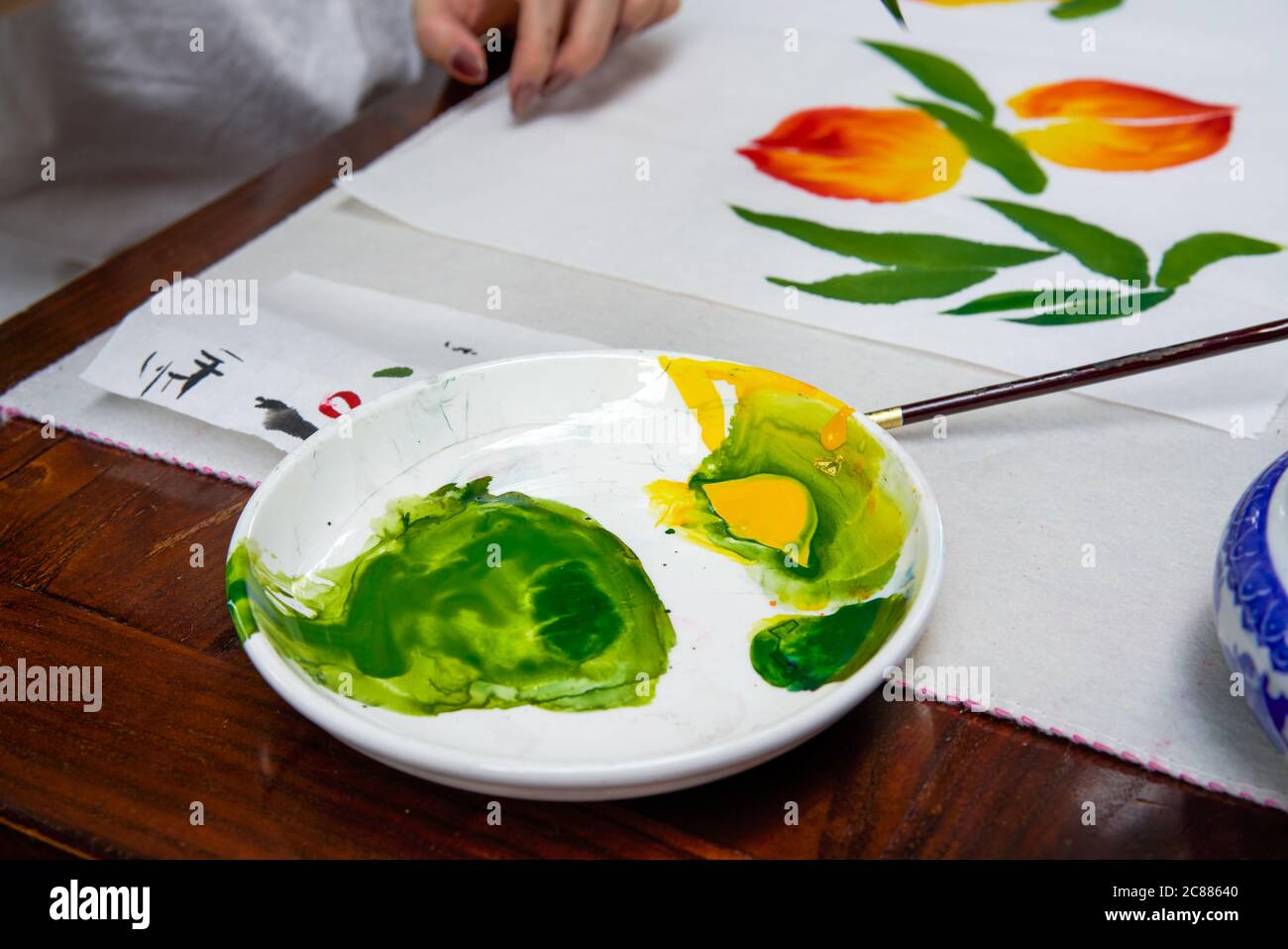 An artist painter is creating traditional Chinese paintings Stock Photo ...