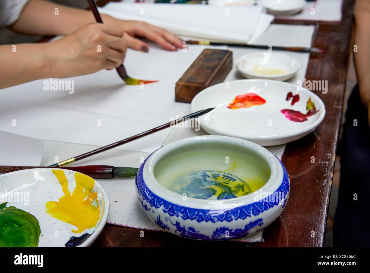 An artist painter is creating traditional Chinese paintings Stock Photo ...
