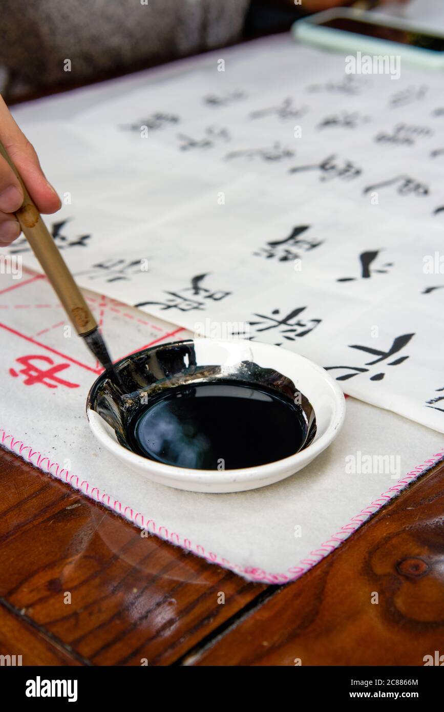 A calligrapher is creating calligraphy and writing calligraphy Stock ...