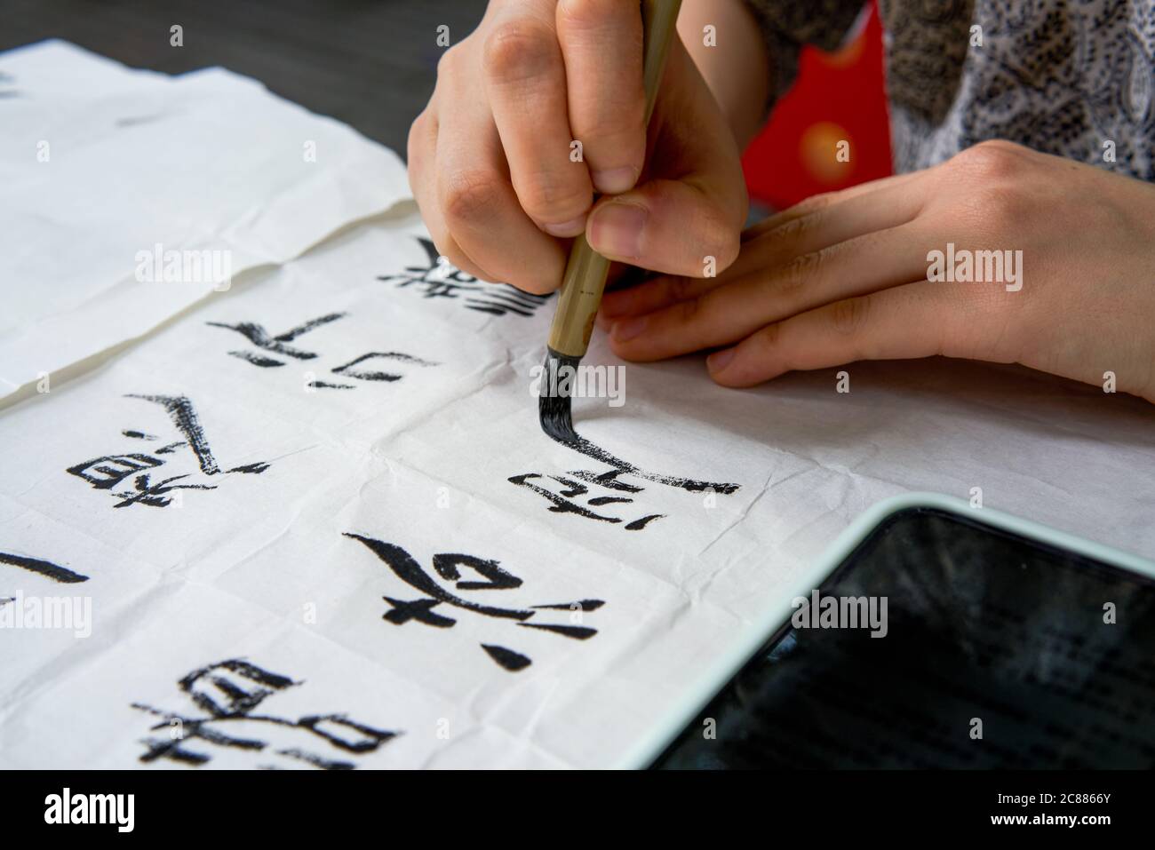 A calligrapher is creating calligraphy and writing calligraphy Stock ...