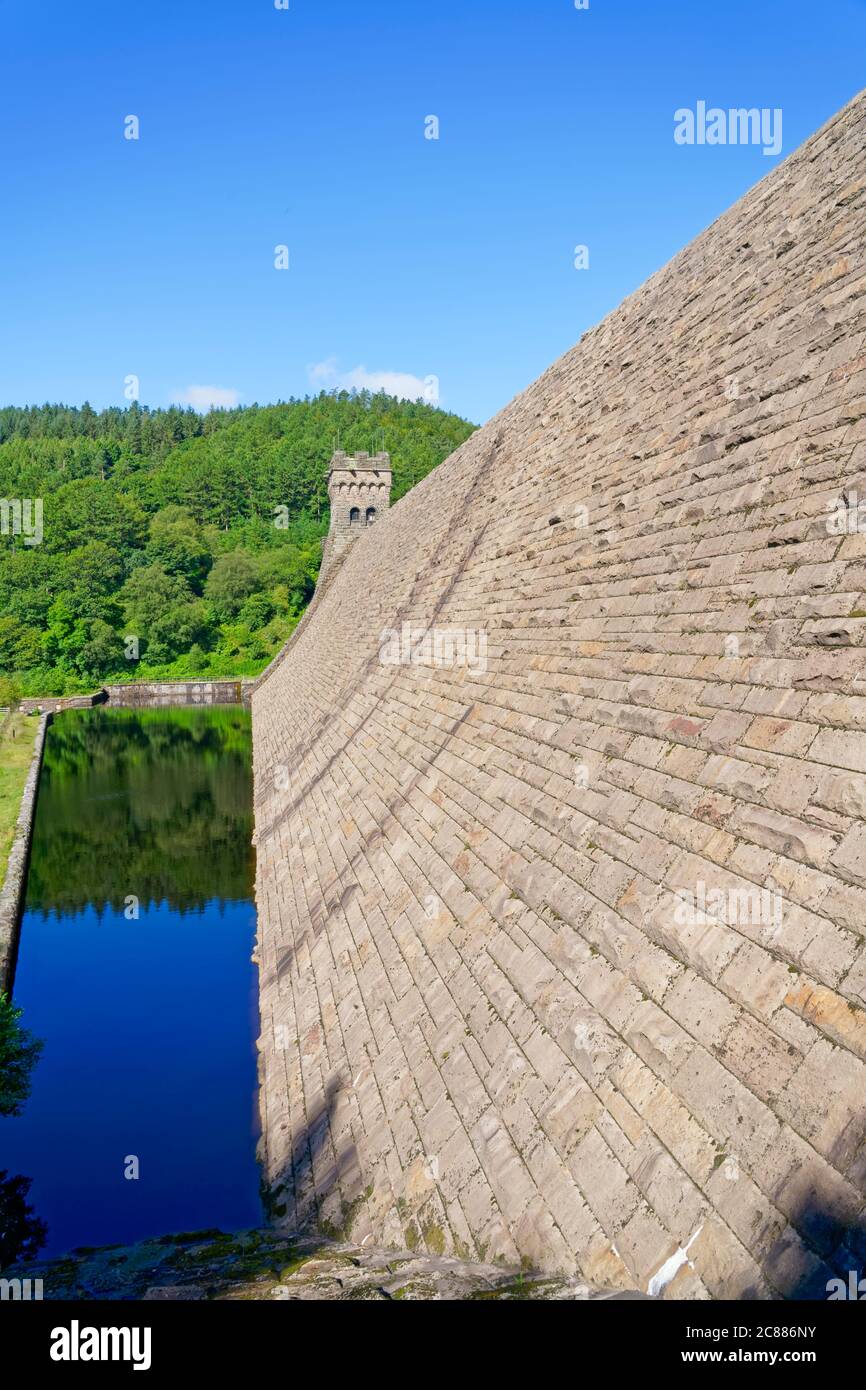 Looking along the curved stone wall of Derwent Dam, Derbyshire, towards ...