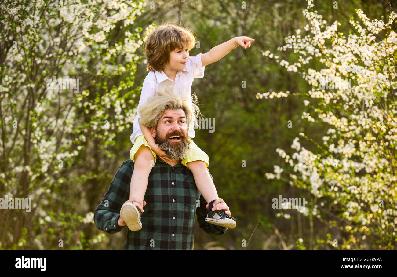 Happy family. Little son. Spring walk. Fatherhood. Fathers day. Little ...