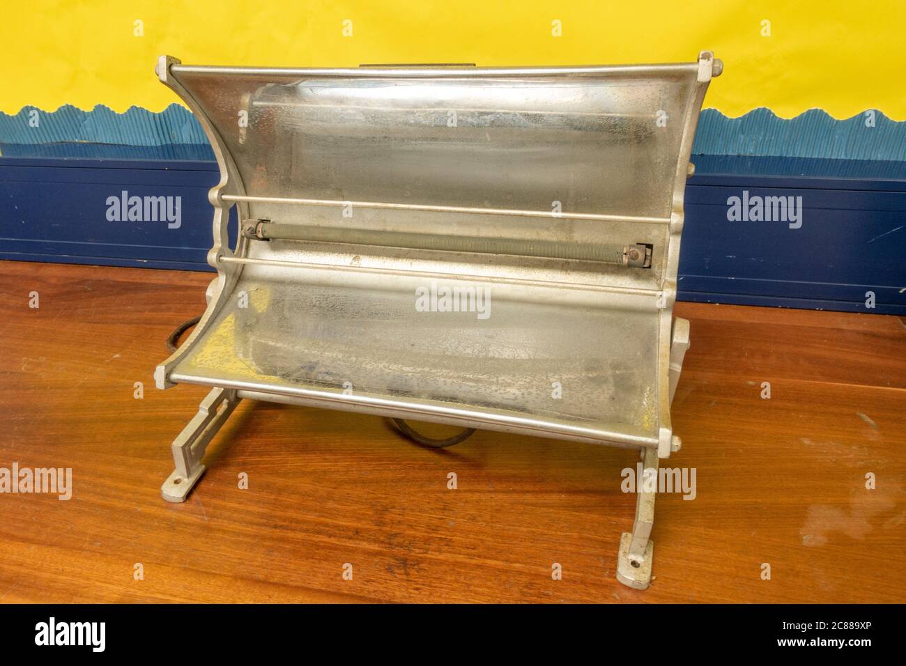 A vintage British made 'Epic' electric single bar fire with a metal ...