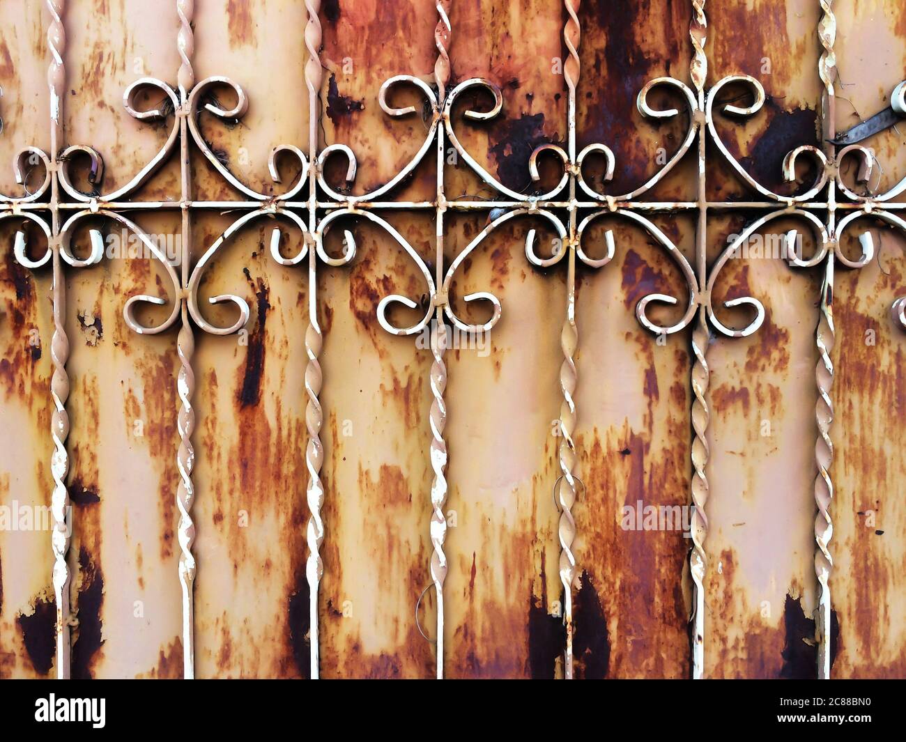 Abandoned wrought iron gate, eroding rust metal iron, vintage ...