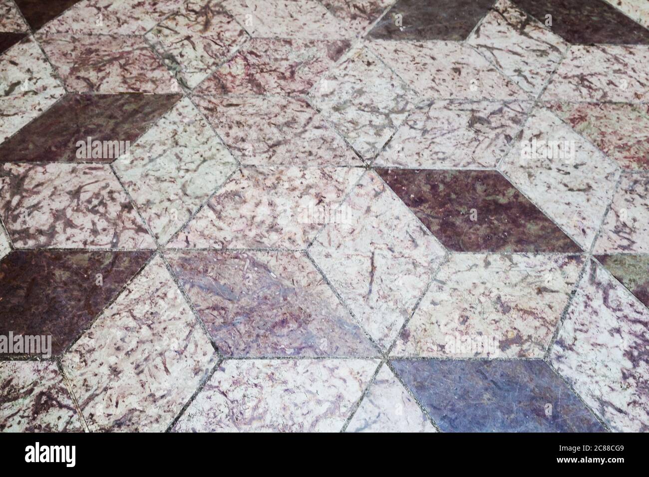 Old floor tiling with abstract cubic pattern, background photo texture ...