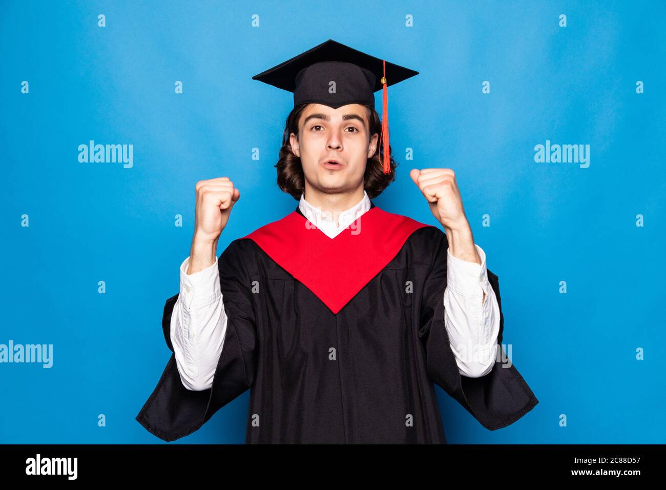 University Graduation Blue Cap And Gown High Resolution Stock ...