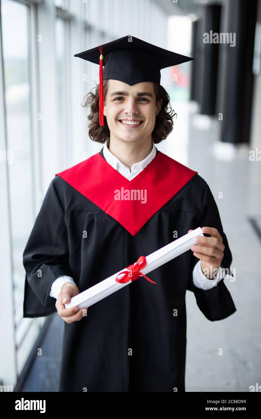 Graduate male student - graduation concepts. Portrait on his graduation ...