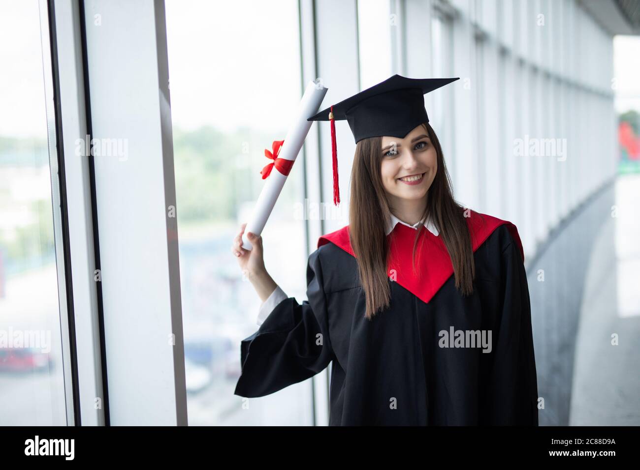 Portrait happy woman on her graduation day University. Education and ...