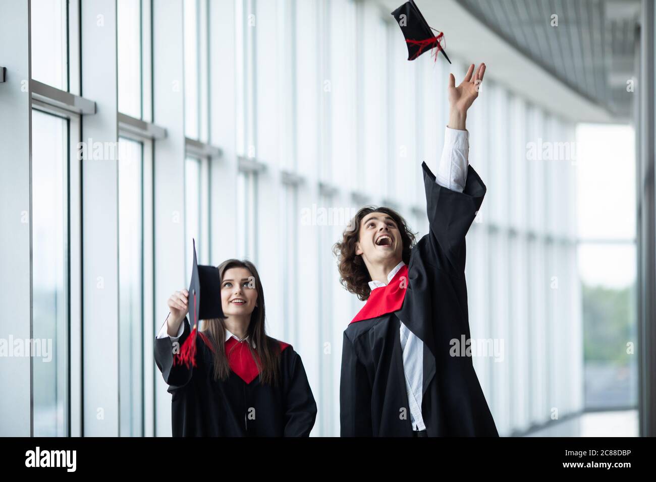 Group happy graduates throwing graduation hi-res stock photography and ...