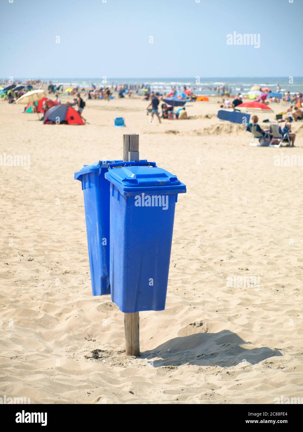 blue dustbins at the beach in Katwjk/NL Stock Photo - Alamy