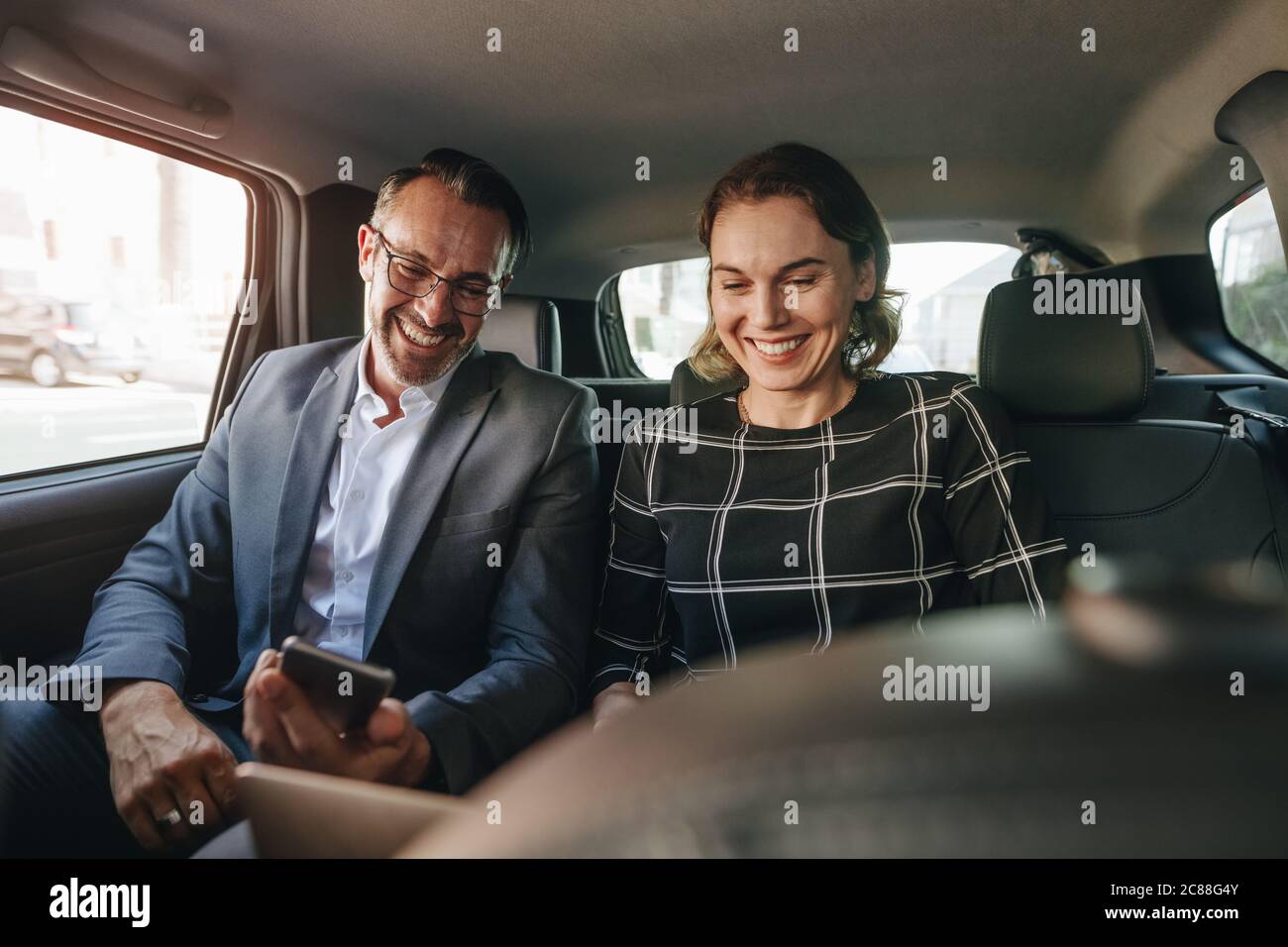Businessman sitting in cab hi-res stock photography and images - Alamy