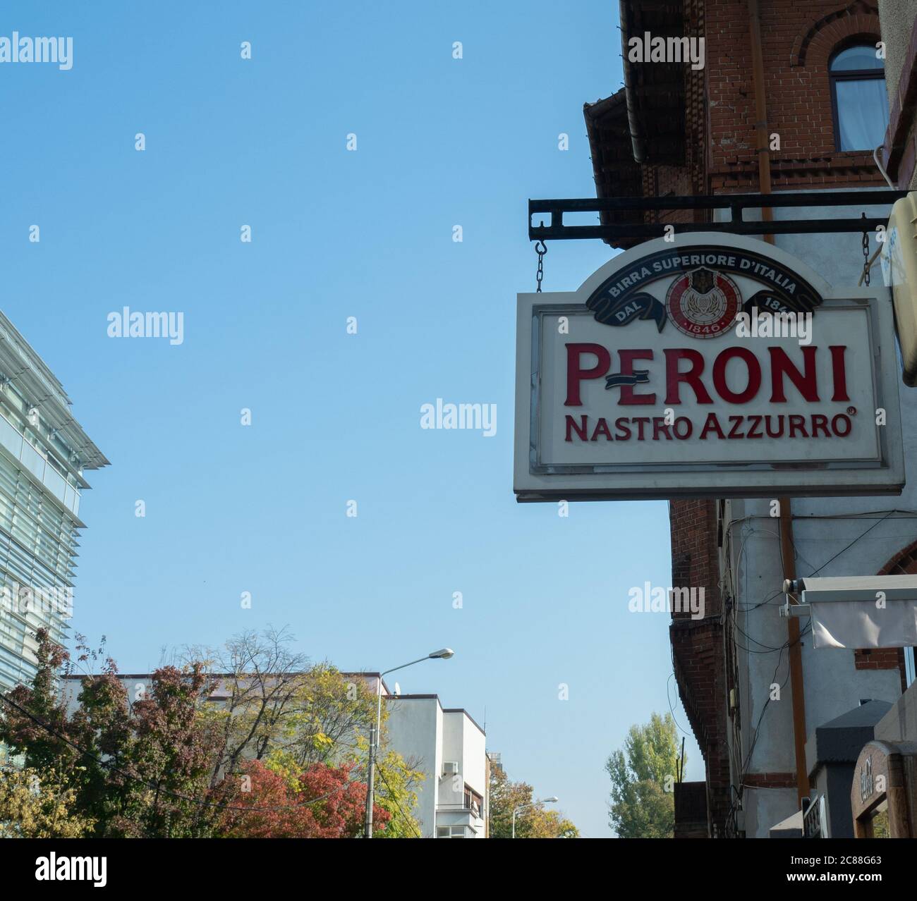 Hanging sign of Peroni Nastro Azzurro, Italian lager beer, hung from ...
