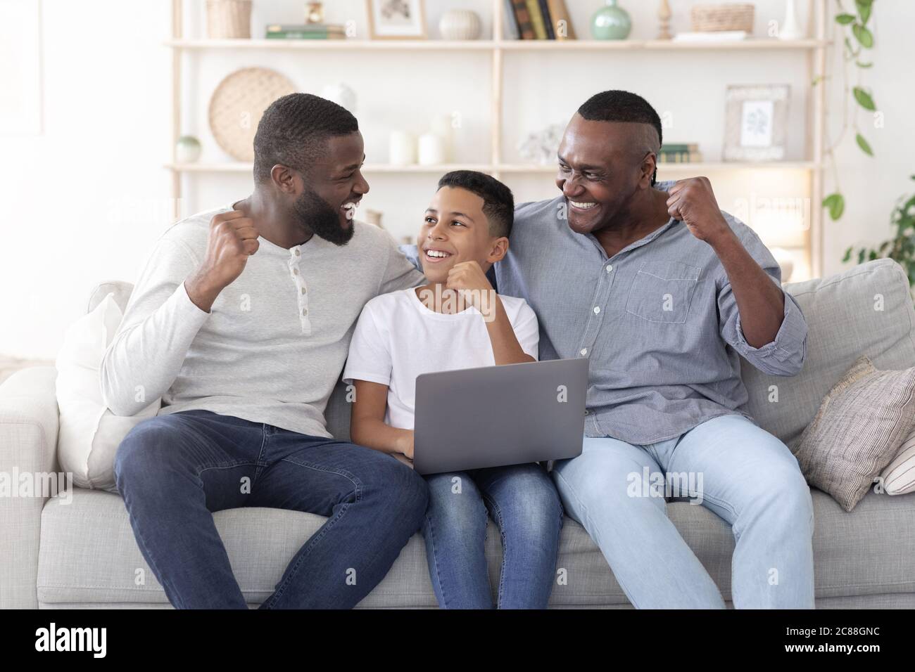 African american grandfather father son hi-res stock photography and ...