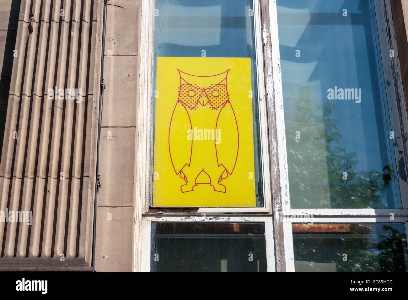 View of Leeds Owl poster in the window of the central library Stock ...