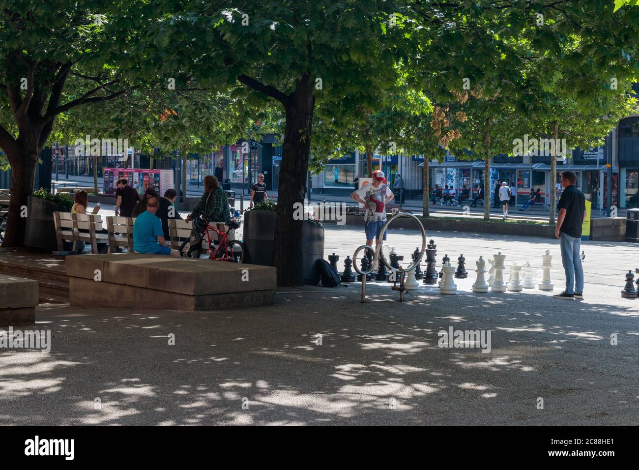 View of men playing Chess outside the central library on The Headrow ...