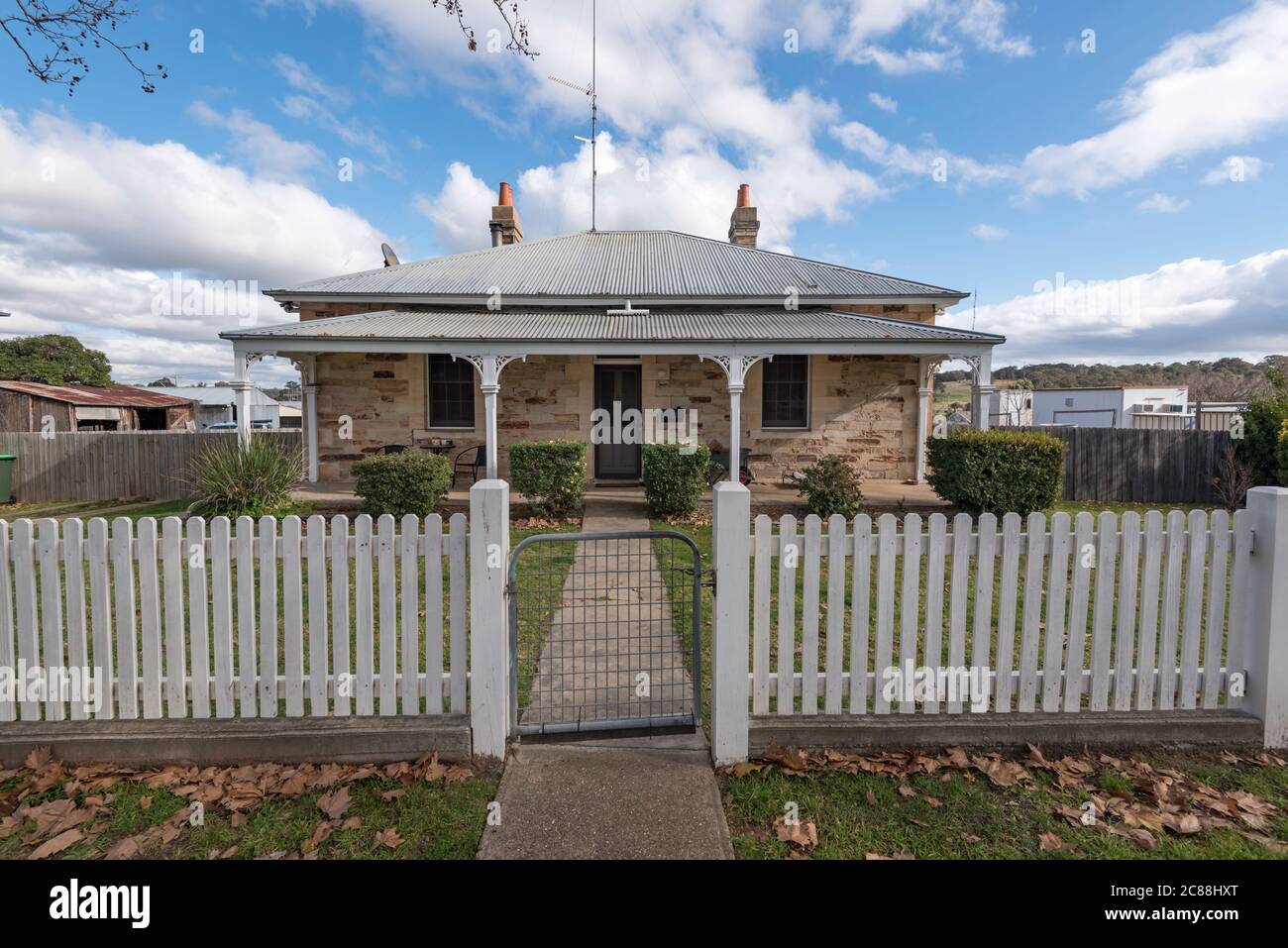 A front view of a Colonial Georgian designed single level home built of ...