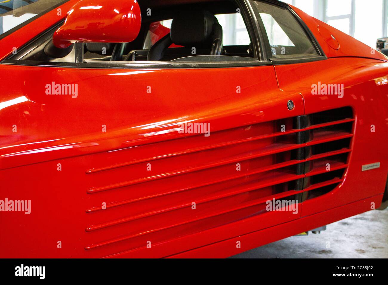 The side air intakes are typical of this sports car of the brand with ...