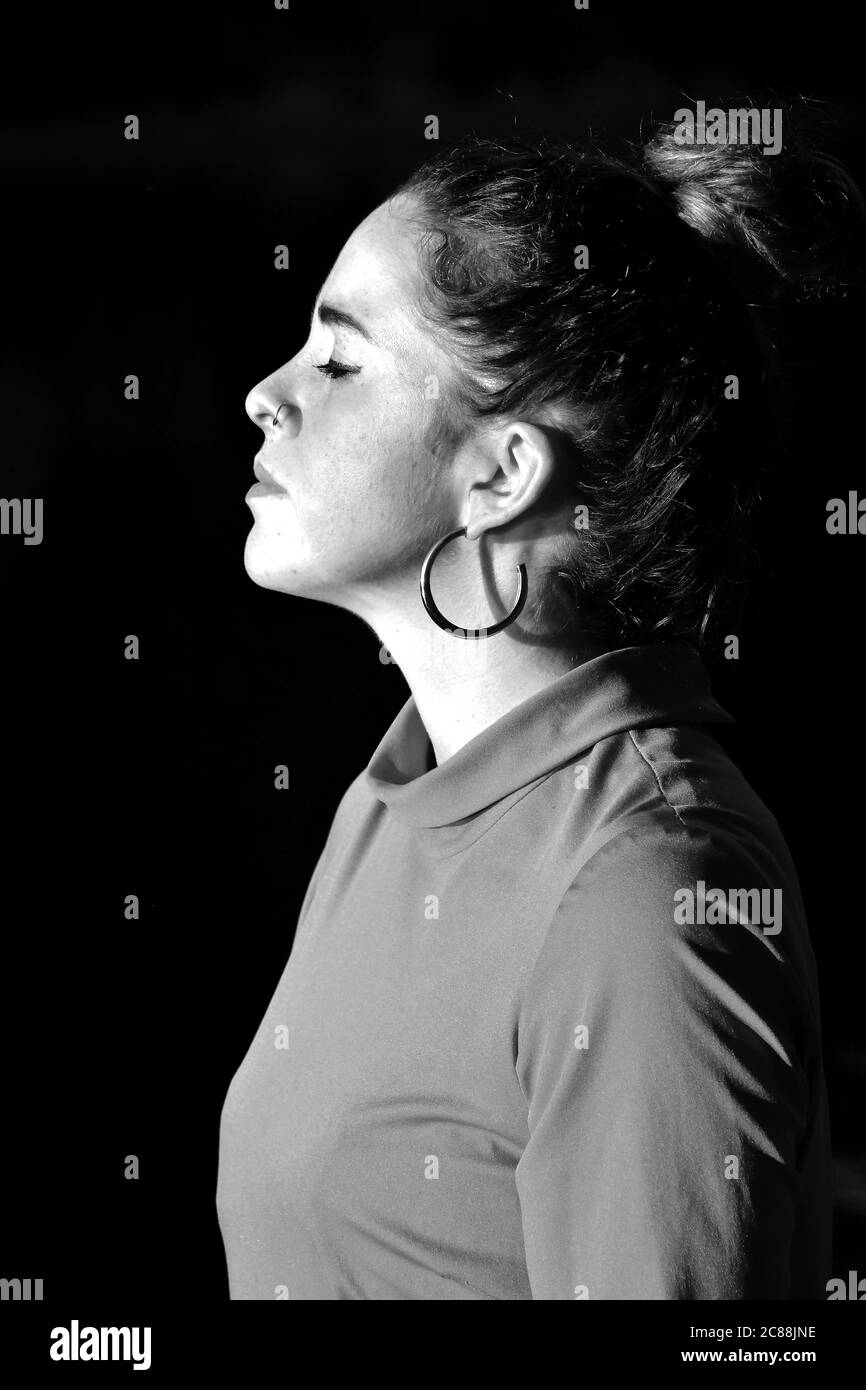 Demure woman hi-res stock photography and images - Alamy