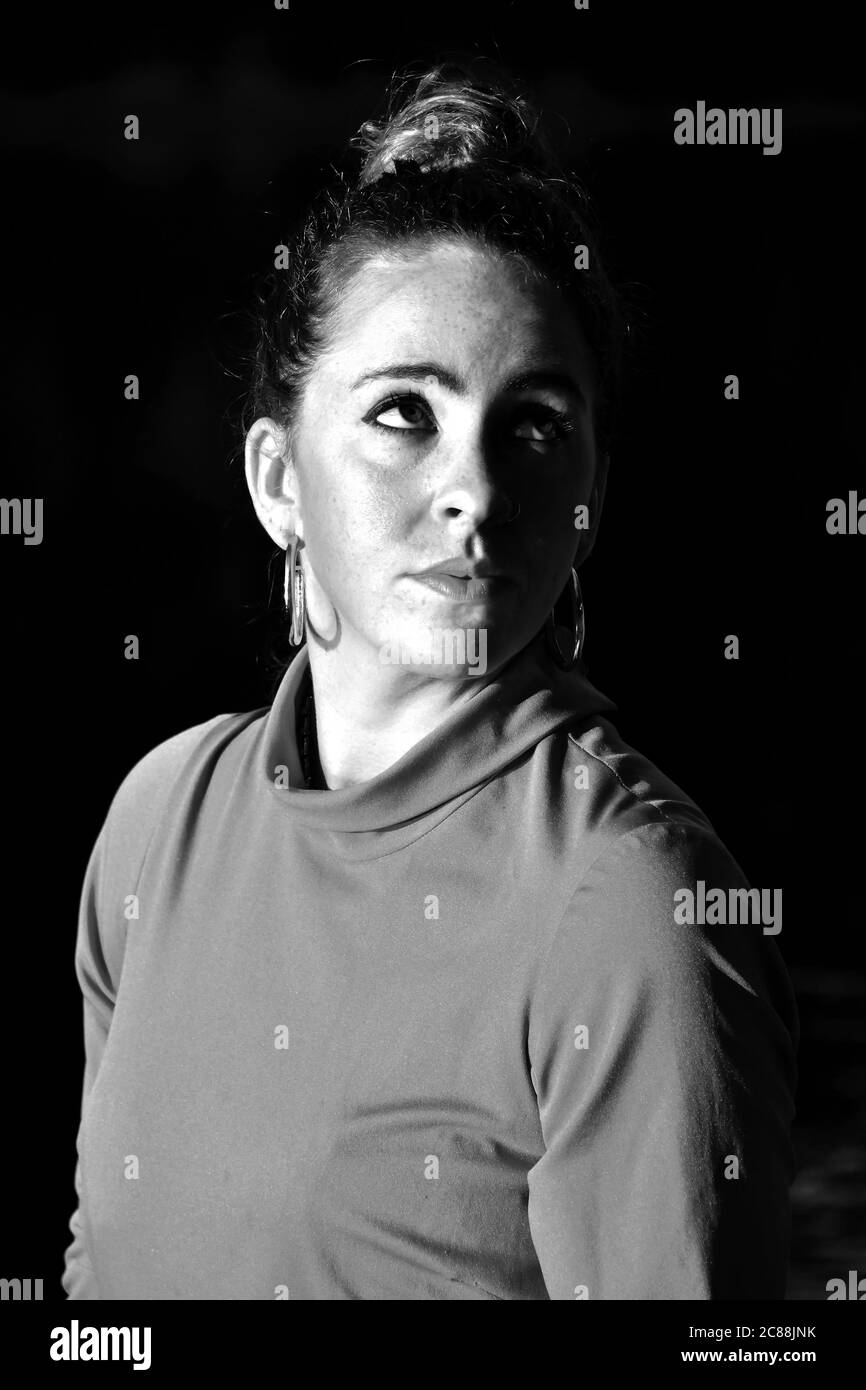 Demure woman hi-res stock photography and images - Alamy