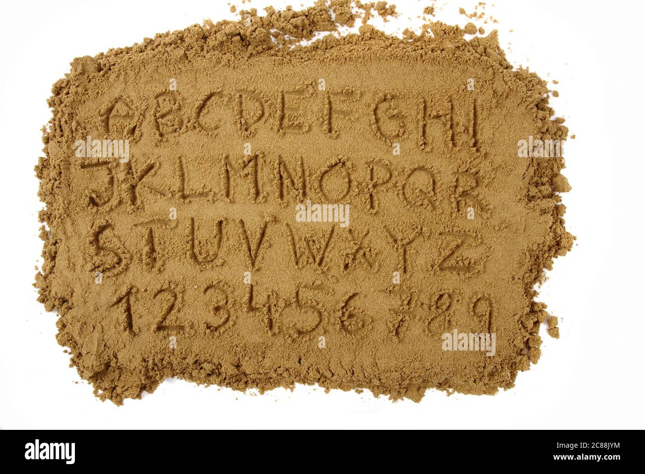 sand alphabet isolated on the white background Stock Photo - Alamy
