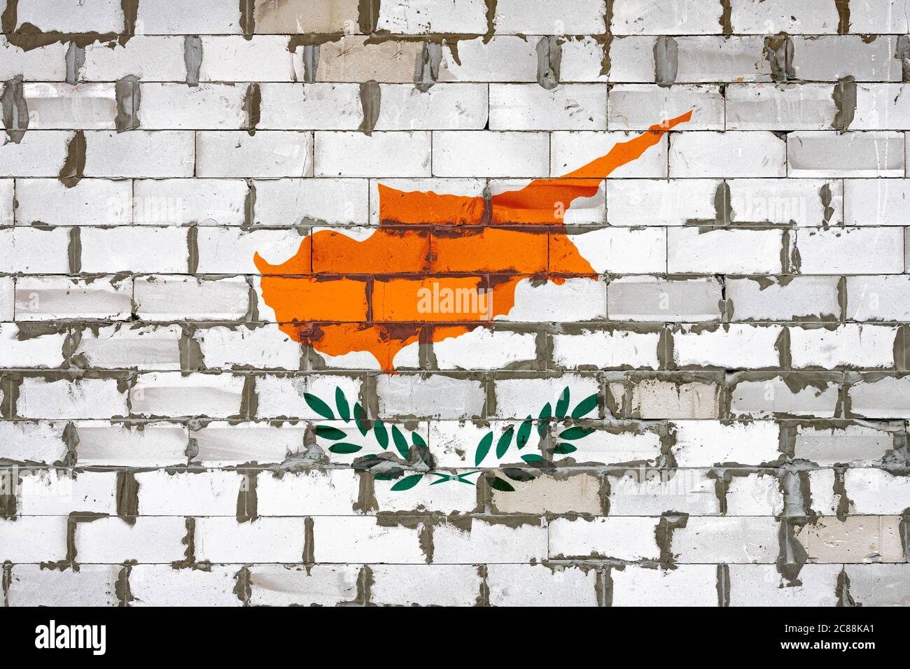 The national flag of Cyprus painted on a wall of sibit blocks with ...