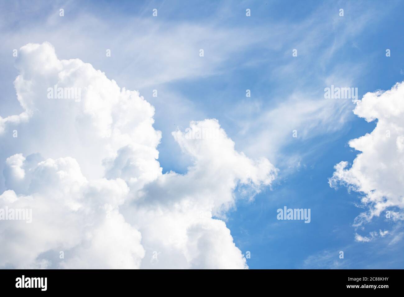 Lush white clouds in the blue sky Stock Photo - Alamy