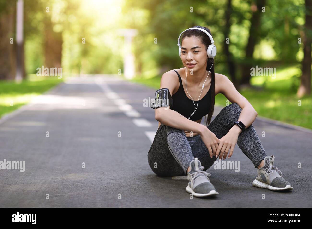 Asian Female Runner Rest High Resolution Stock Photography and Images ...
