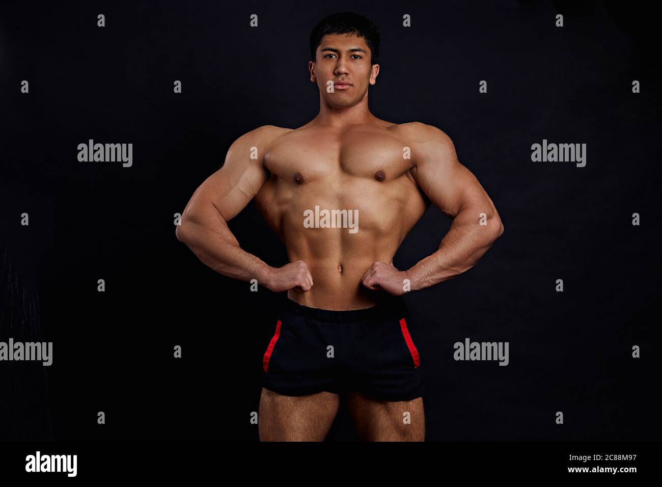professional bodybuilder developing musculature. close up photo ...