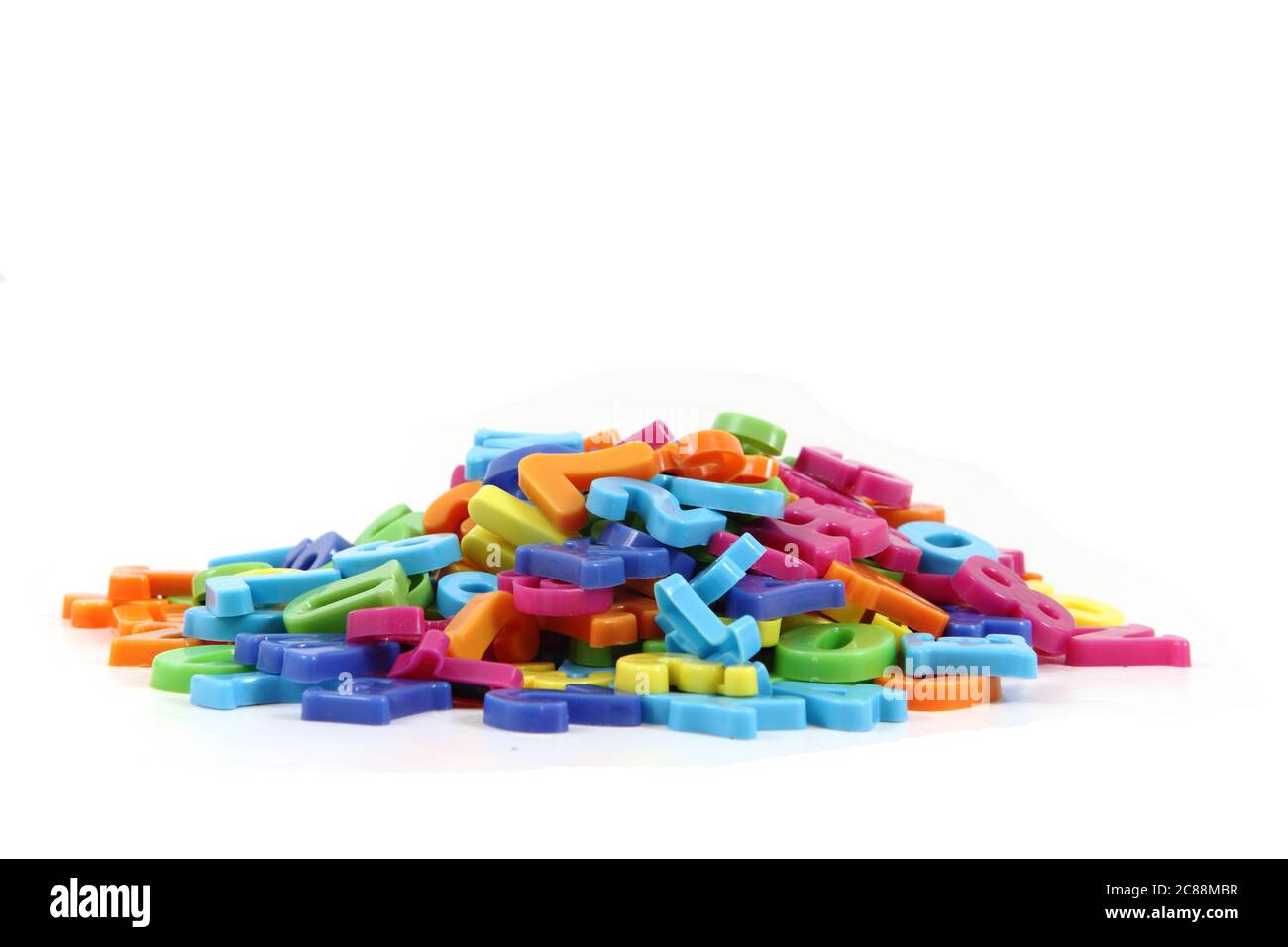 color plastic letters isolated on the white background Stock Photo - Alamy