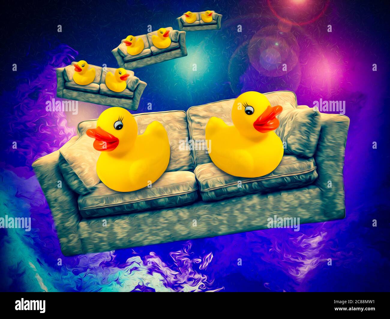 Plastic ducks on a sofa flying through space Stock Photo - Alamy