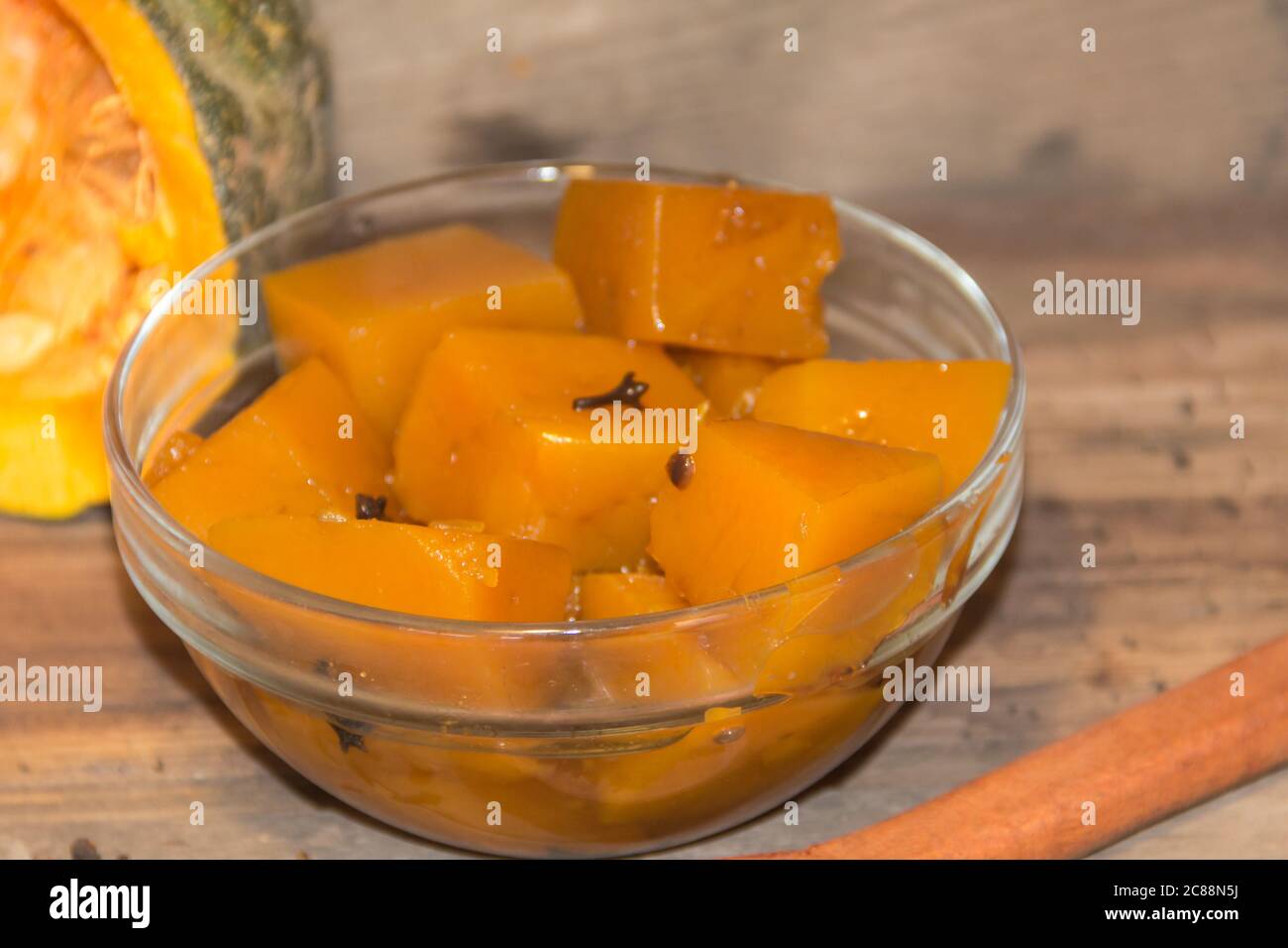 cubed squash candy with syrup and cloves Stock Photo - Alamy