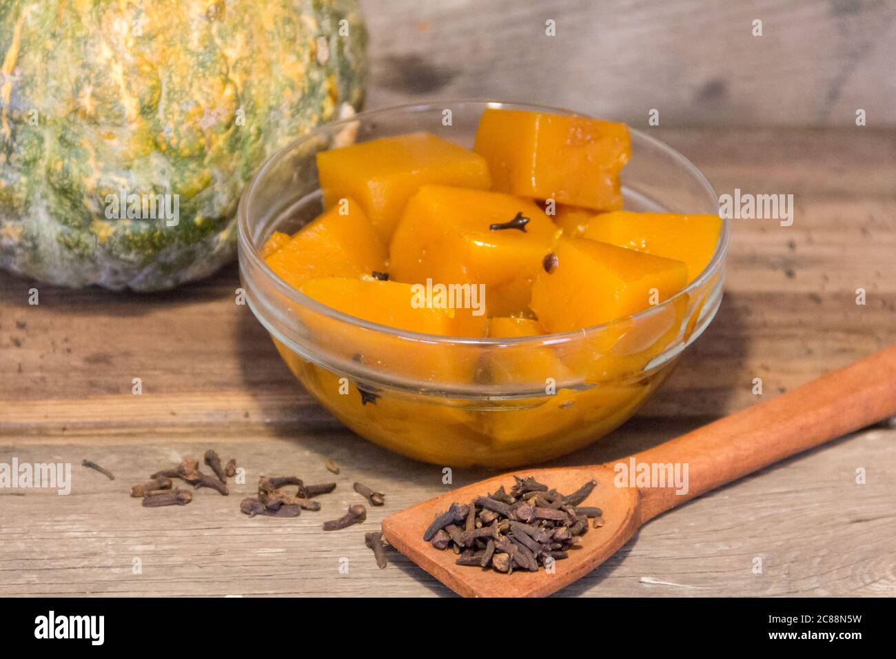 cubed squash candy with syrup and cloves Stock Photo - Alamy