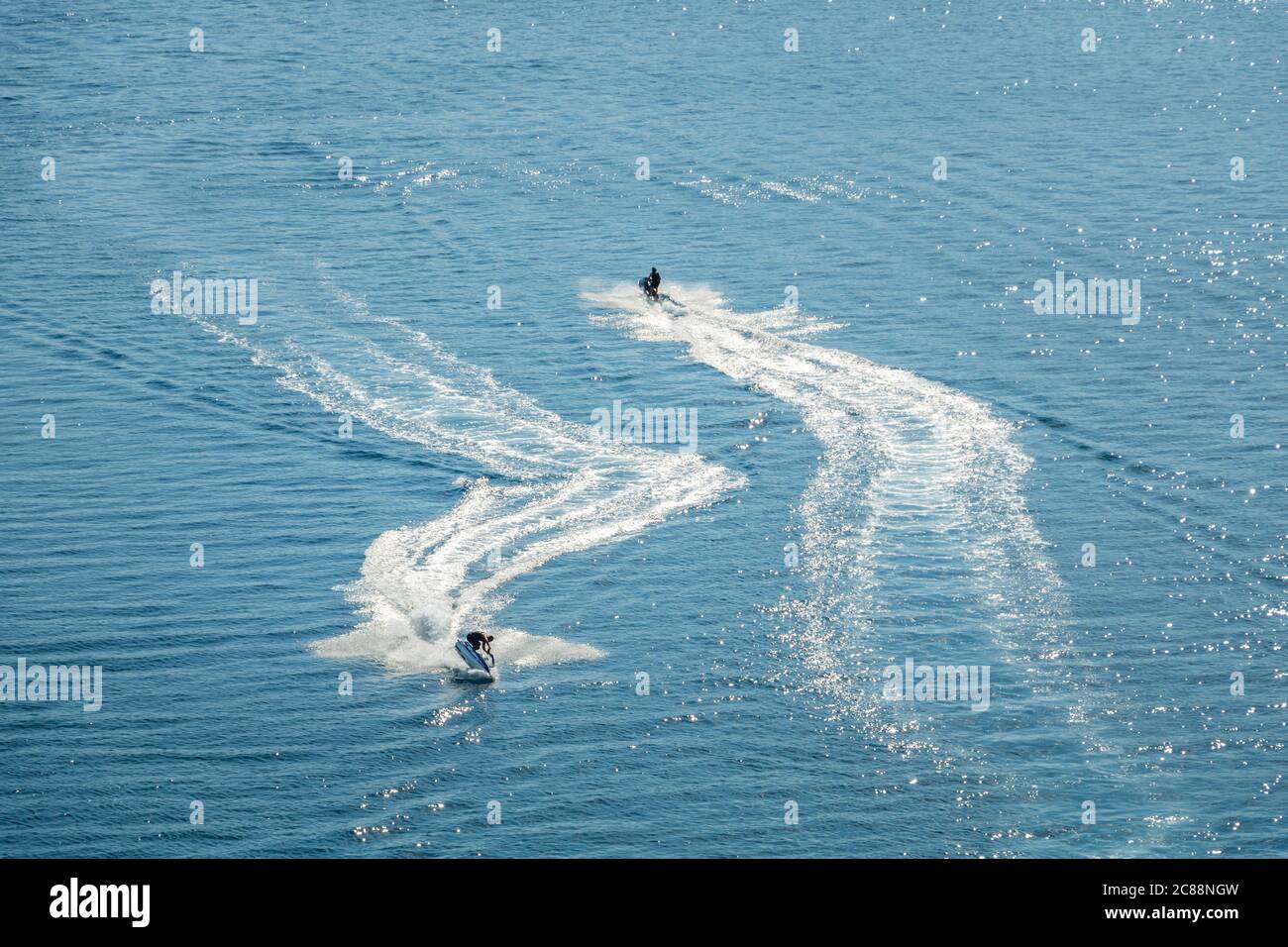 Man riding dolphin hi-res stock photography and images - Alamy