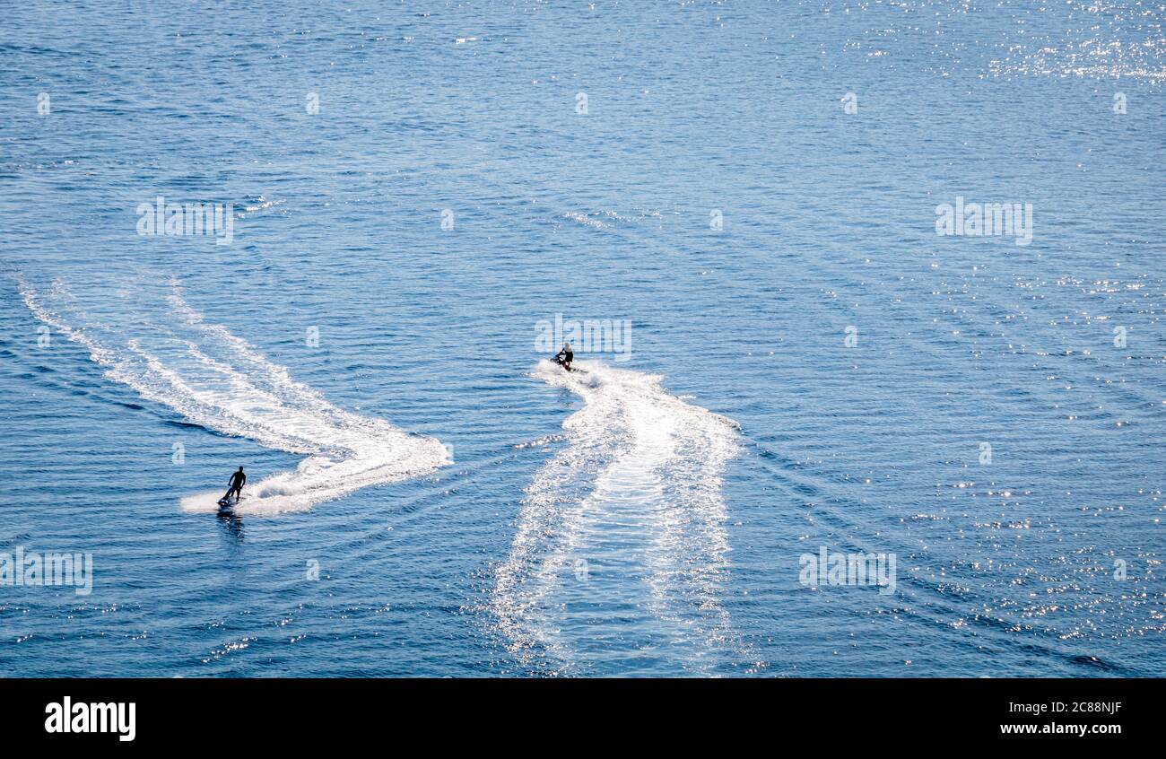 Man riding dolphin hi-res stock photography and images - Alamy