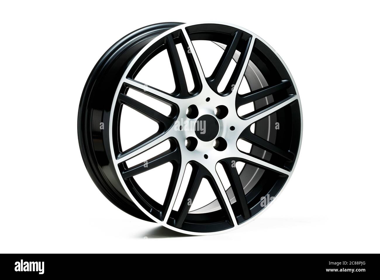 Black mag wheel isolated on white background Stock Photo - Alamy