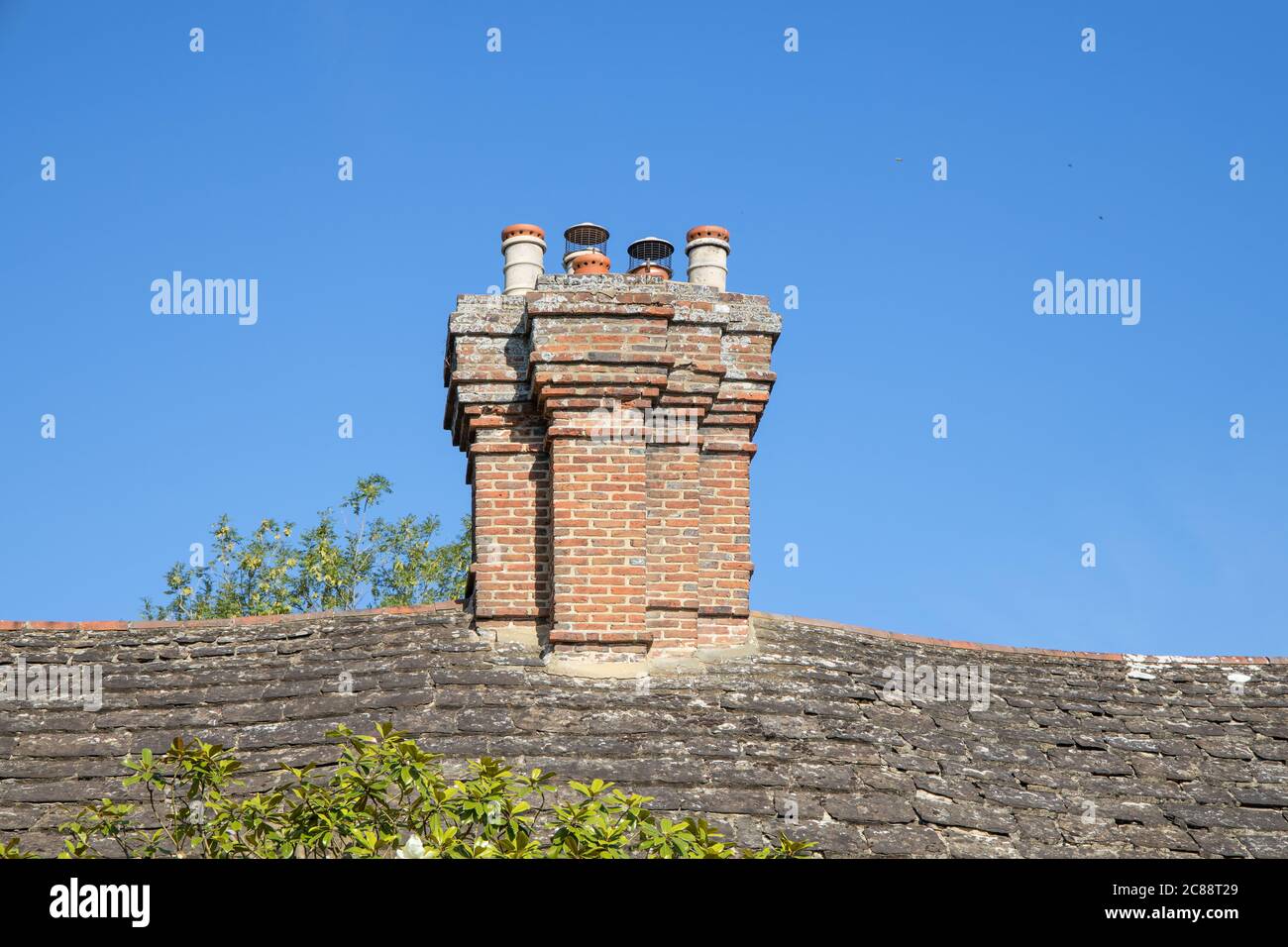 old roof and chimneys in rusper village west sussex Stock Photo - Alamy