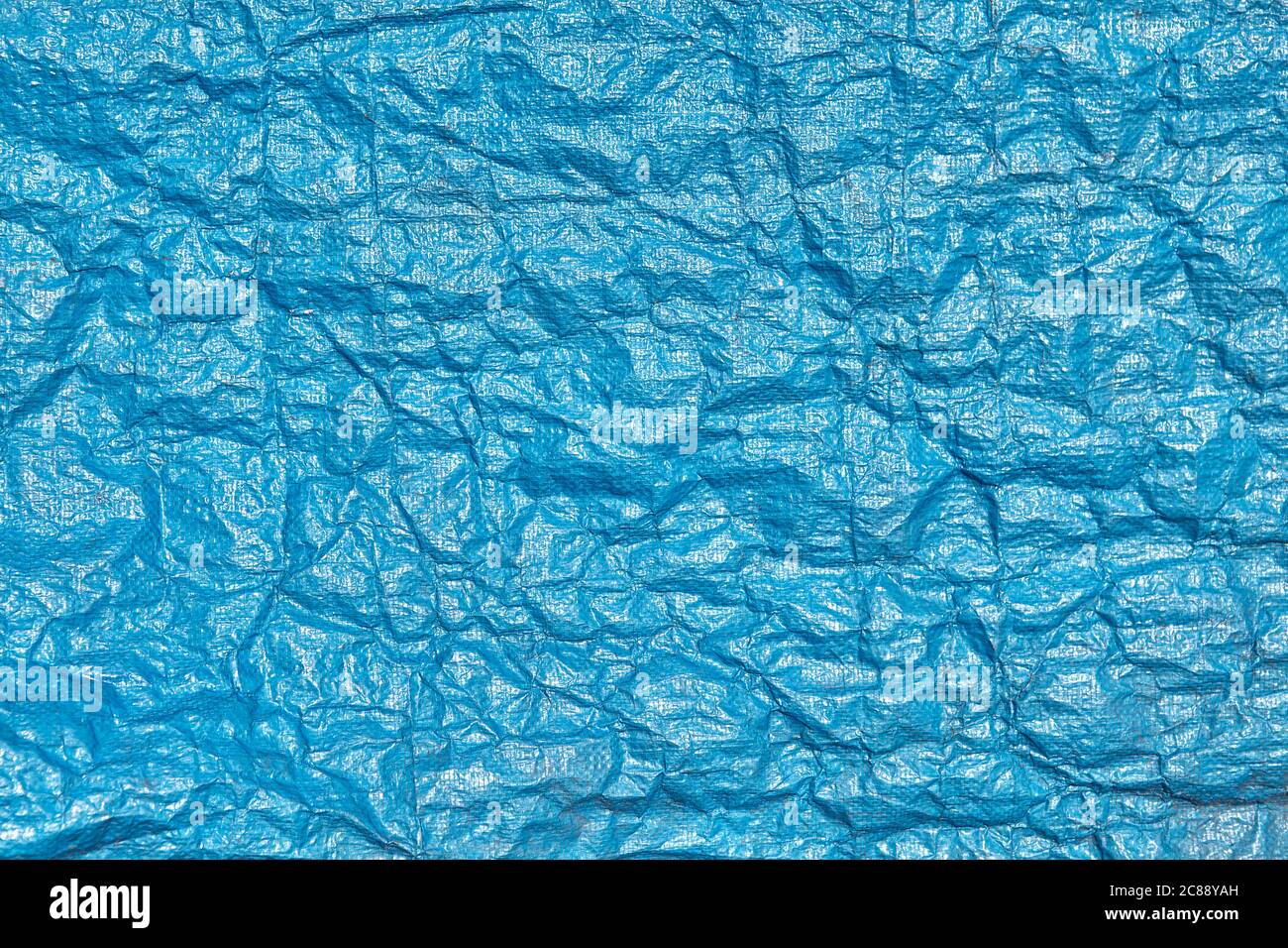 Plastic texture of blue polypropylene fabric for use in construction ...