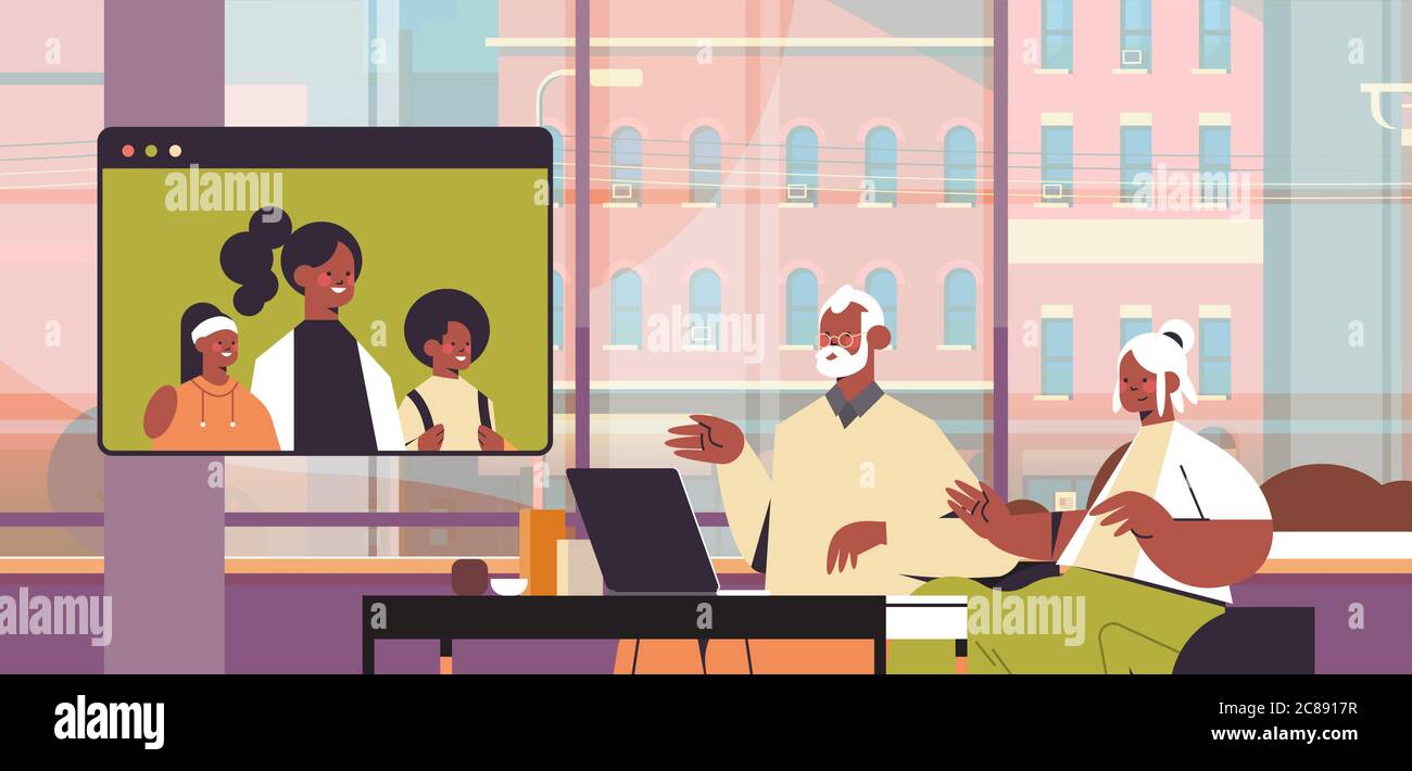 parents with child having virtual meeting with grandparents during ...